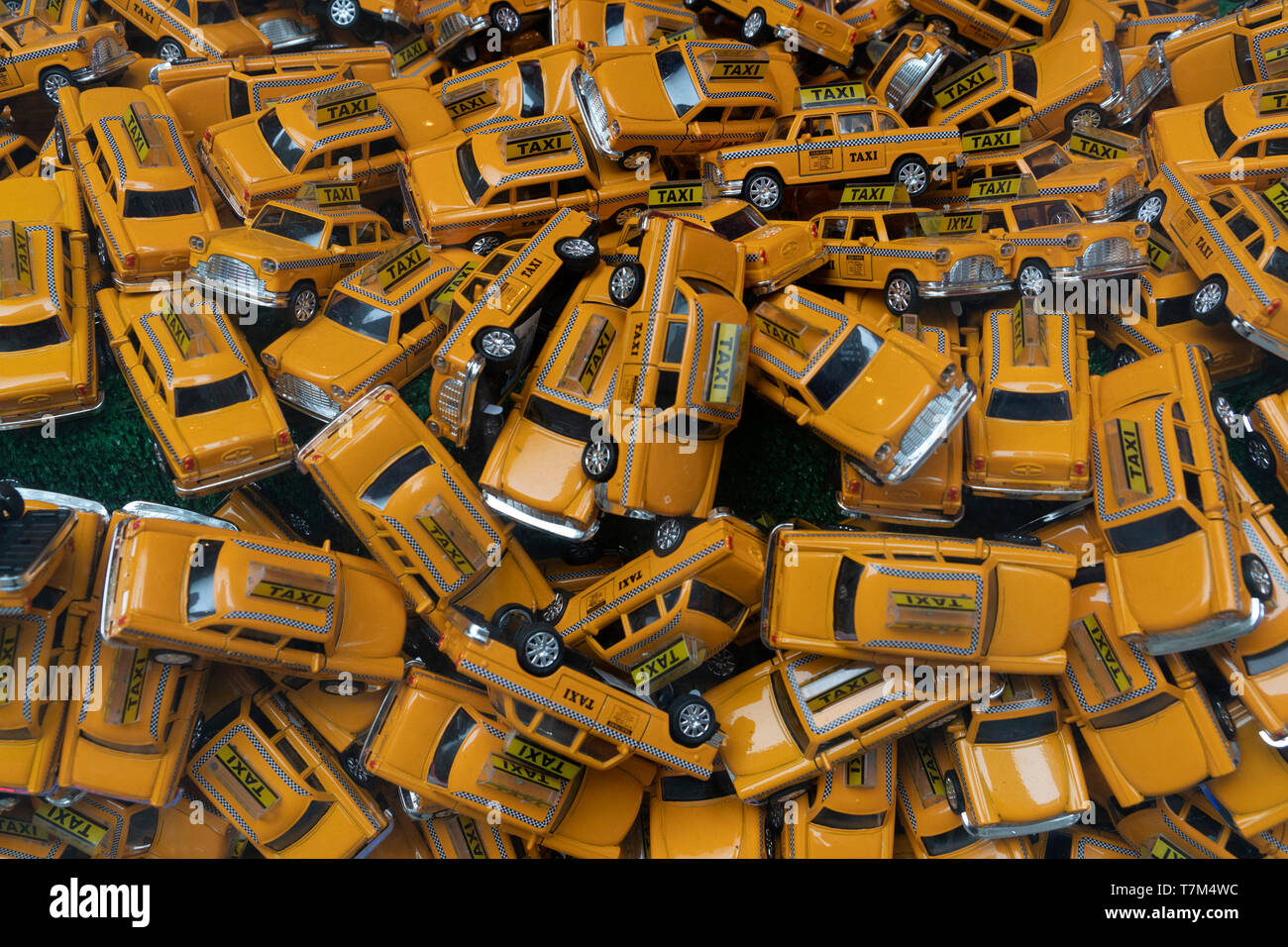 Many new york city nyc yellow taxi cab models Stock Photo - Alamy