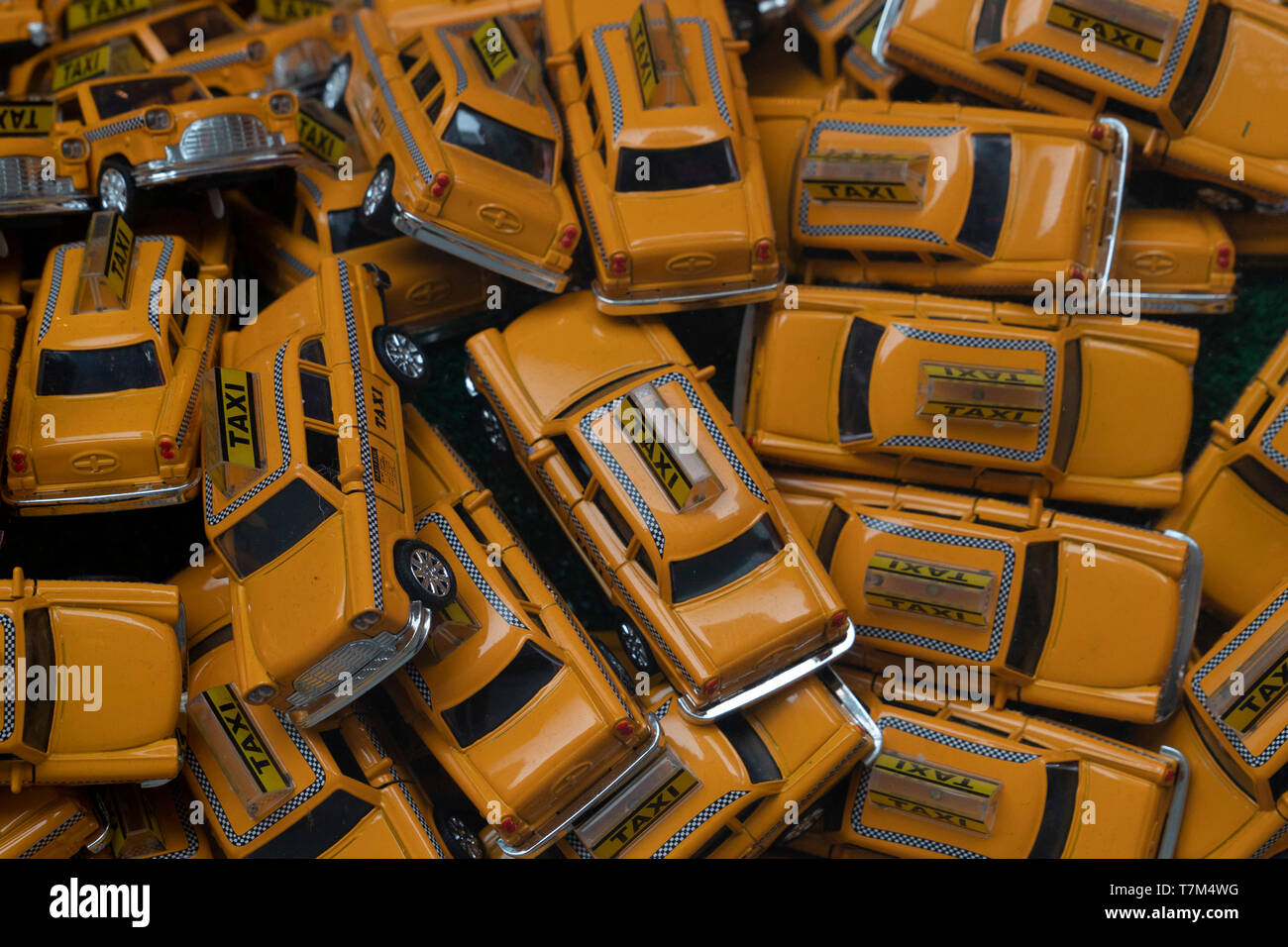 Many new york city nyc yellow taxi cab models Stock Photo - Alamy