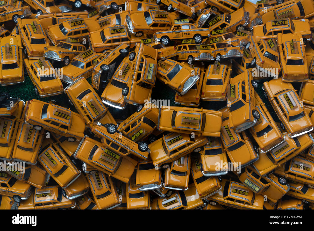 Many new york city nyc yellow taxi cab models Stock Photo - Alamy