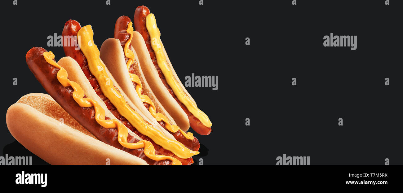 four big american hot dogs Stock Photo - Alamy