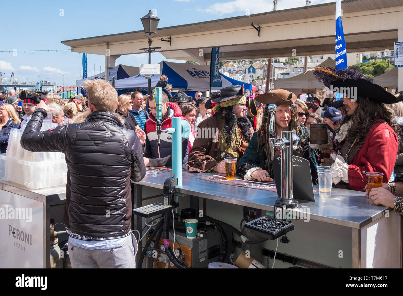 Locals and visitors dress up as pirates for the Brixham Pirate Festival ...