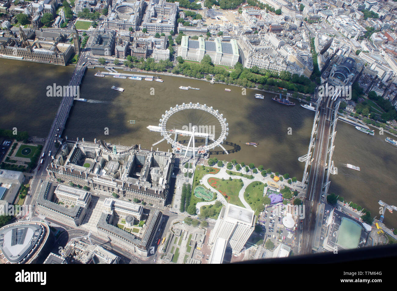 The tourist attraction of The London Eye on the South Bank of the River ...