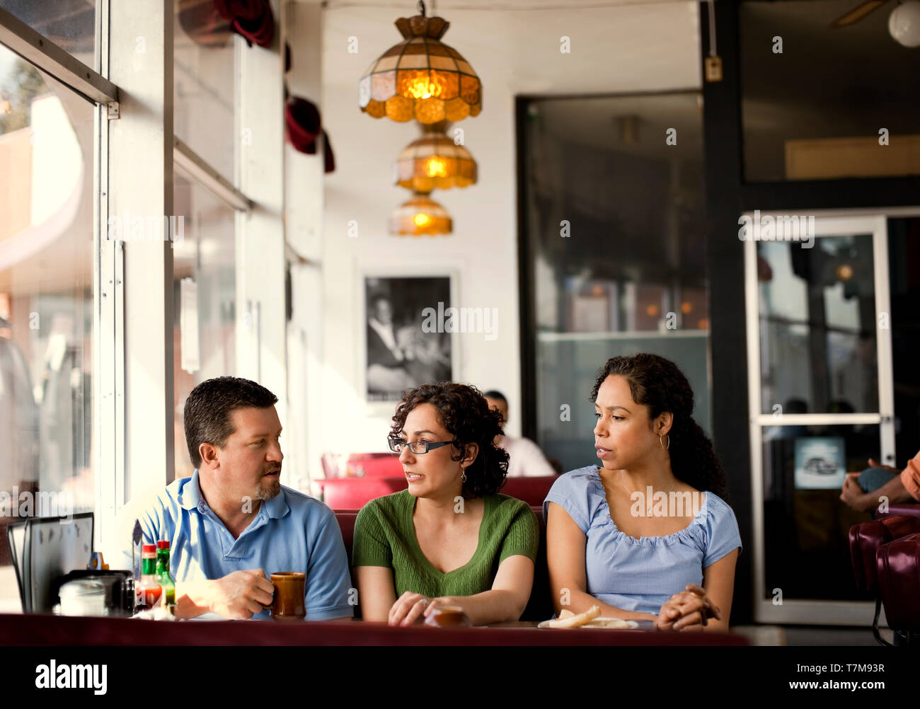 Group of adults at diner hi-res stock photography and images - Alamy