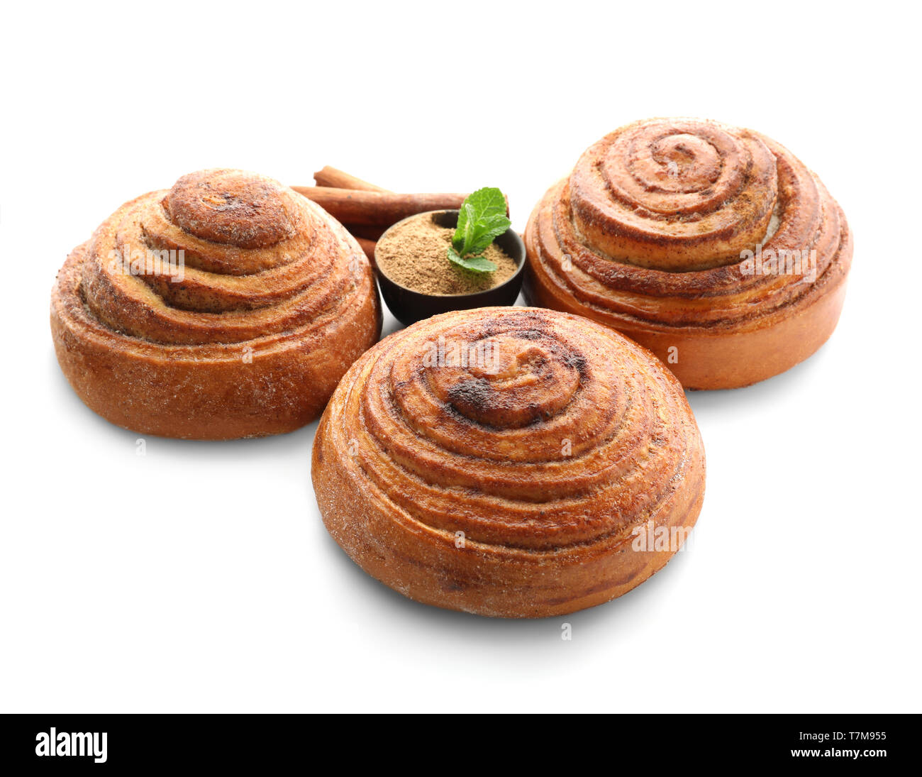 Sweet cinnamon buns on white background Stock Photo - Alamy