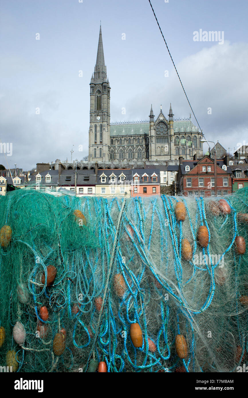 St Colman's Cathedral, Cobh, Ireland with fishing nets in foreground ...