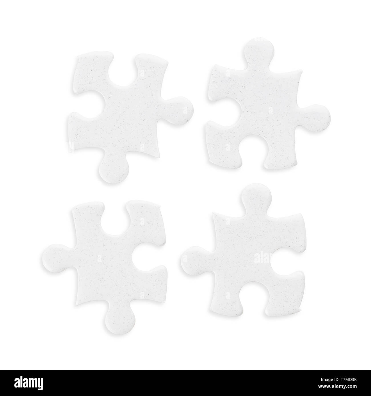 Four white jigsaw puzzle pieces set. Isolated on white, clipping path ...