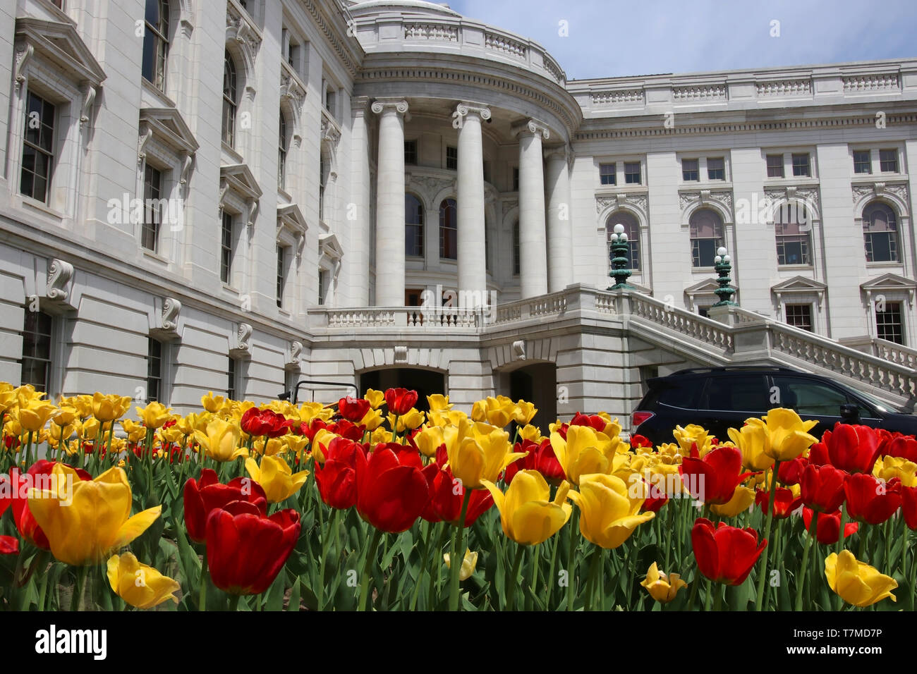 Wisconsin State Capitol building spring view with flower bed with ...