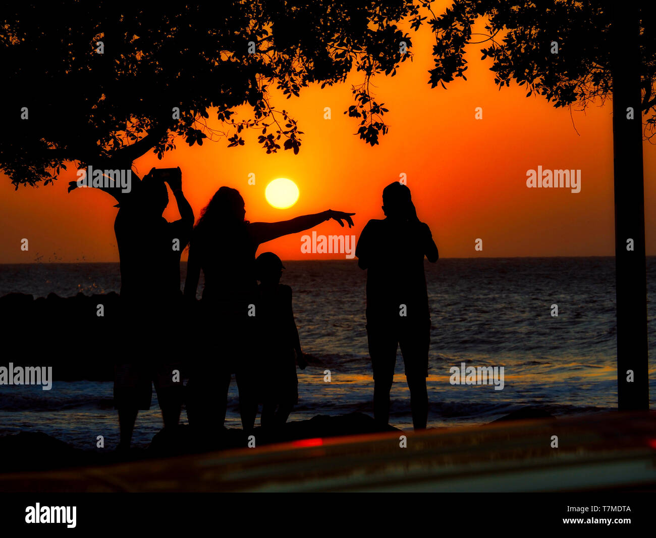 Silhouette people enjoying sunset hi-res stock photography and images ...