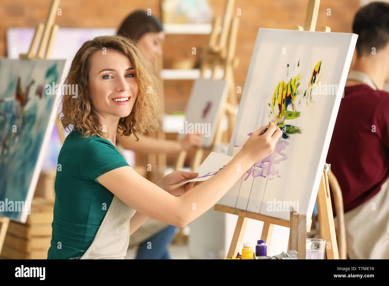 Female student during classes in school of painters Stock Photo - Alamy