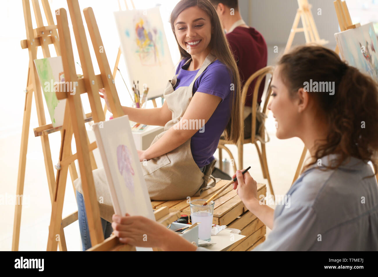 Beautiful students during classes in school of painters Stock Photo - Alamy