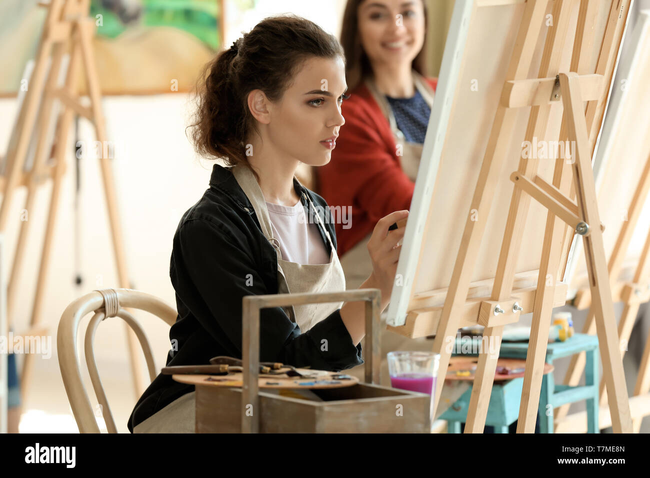 Female student during classes in school of painters Stock Photo - Alamy
