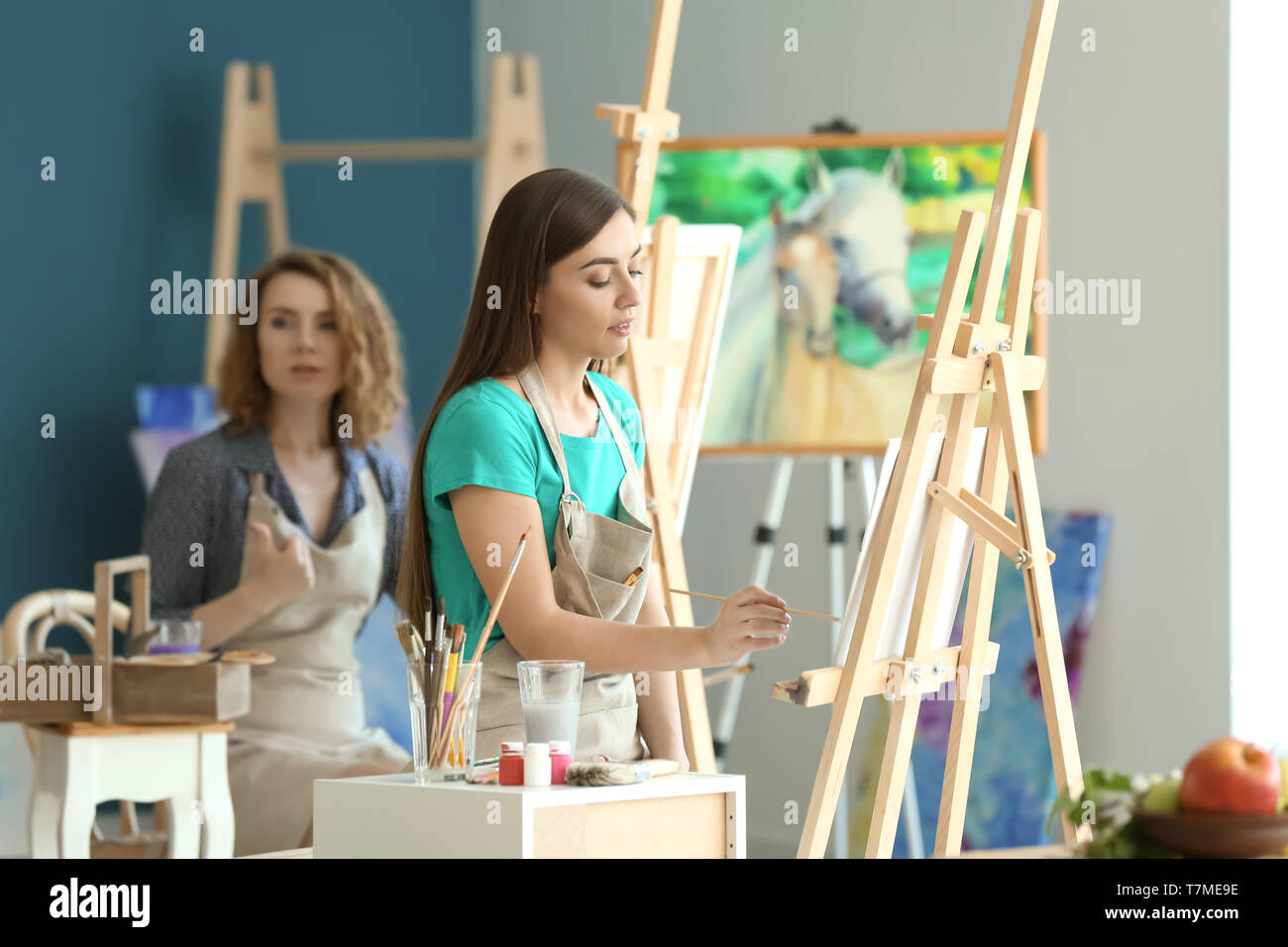 Female student during classes in school of painters Stock Photo - Alamy