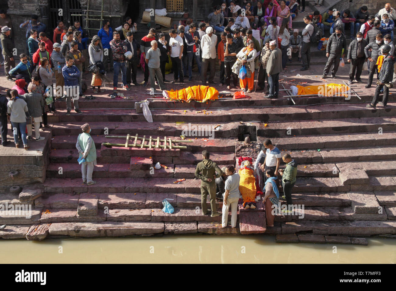 Preparation for cremation of bodies at ghat on Bagmati River ...
