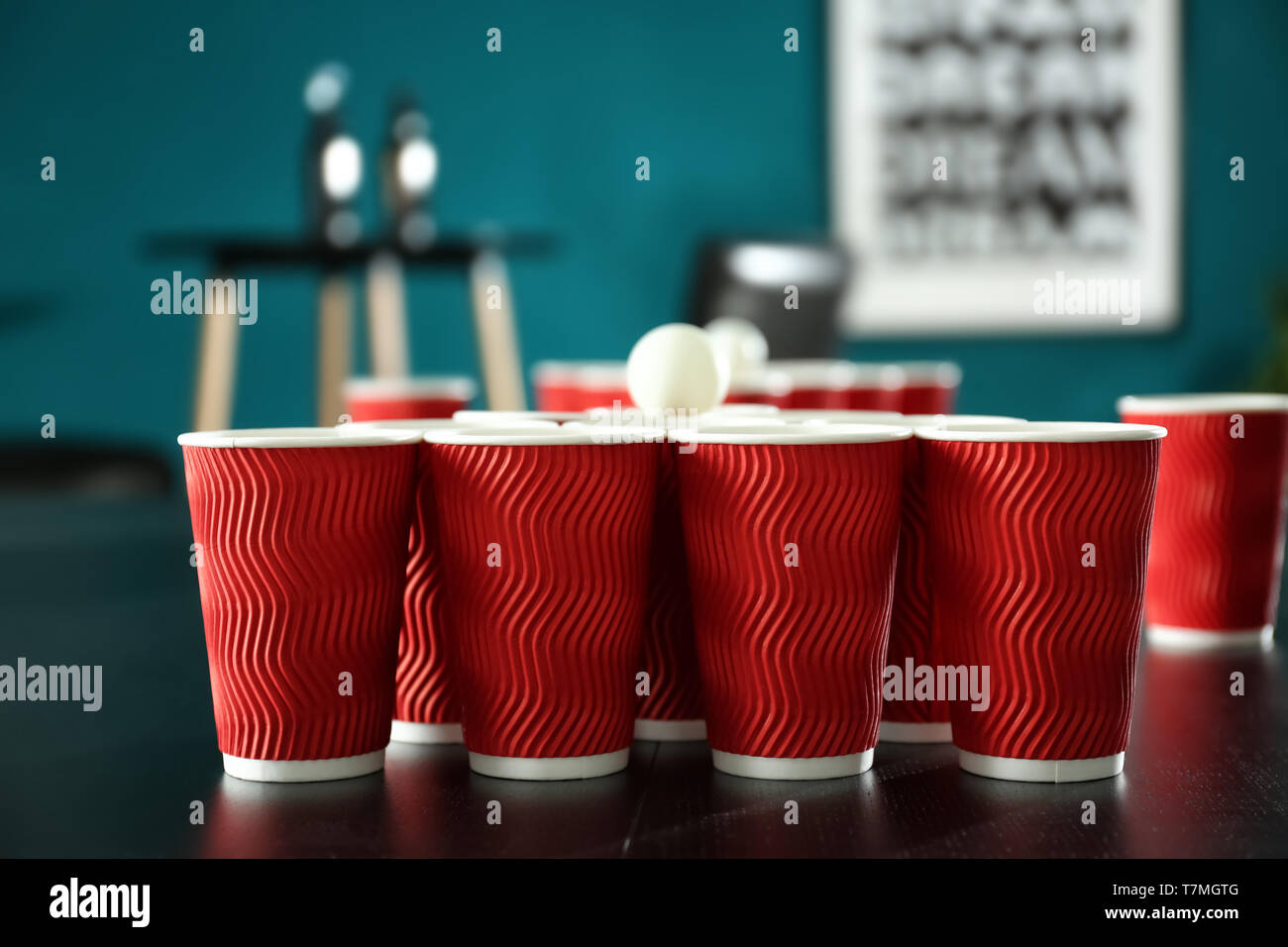 Set for beer pong game on table Stock Photo - Alamy