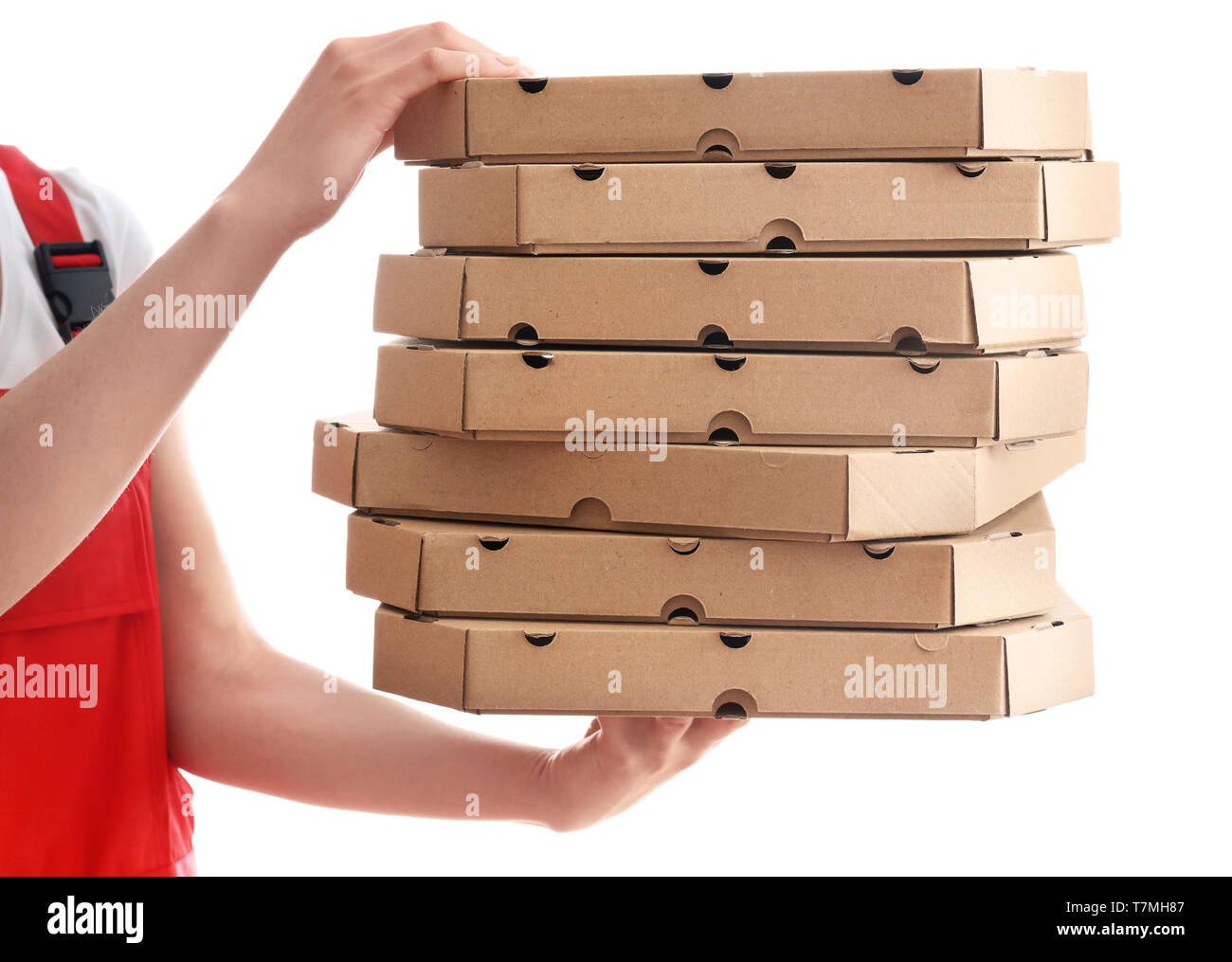 Delivery woman with cardboard pizza boxes on white background Stock ...