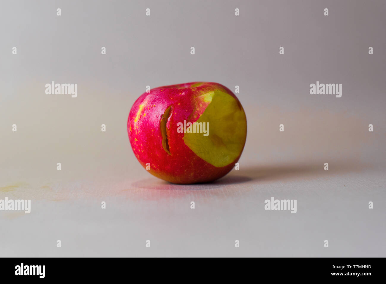 apple with missing a bite isolated on white background Stock Photo - Alamy