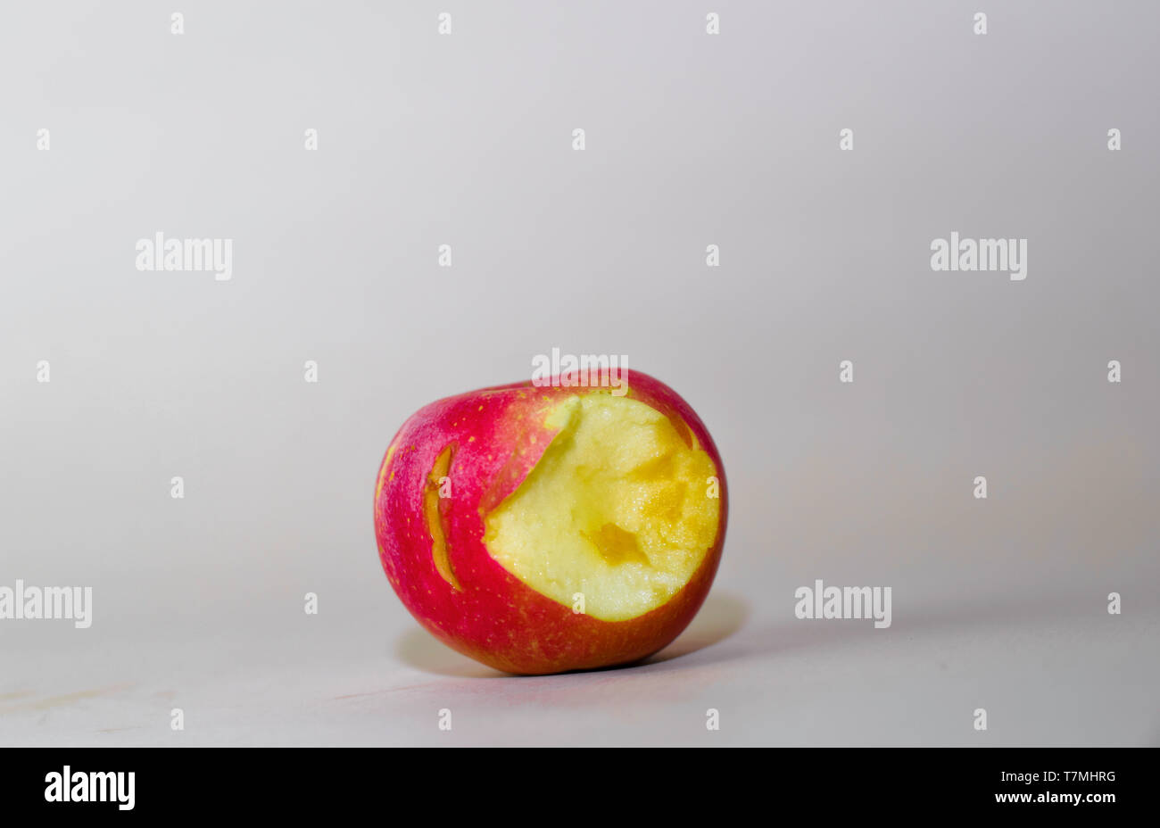apple with missing a bite isolated on white background Stock Photo - Alamy