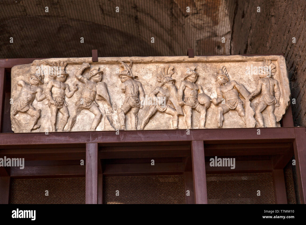 Carvings of gladiators at Colosseum or Coliseum also known as the ...