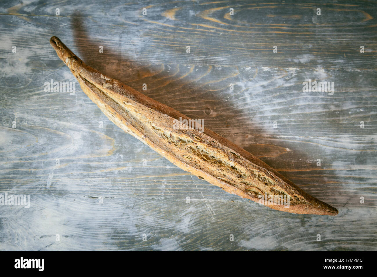 Traditional French baguette, a ficelle flute type, a thin version with ...