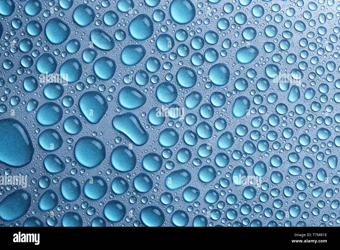 Colorful liquid metal water drops hi-res stock photography and images ...