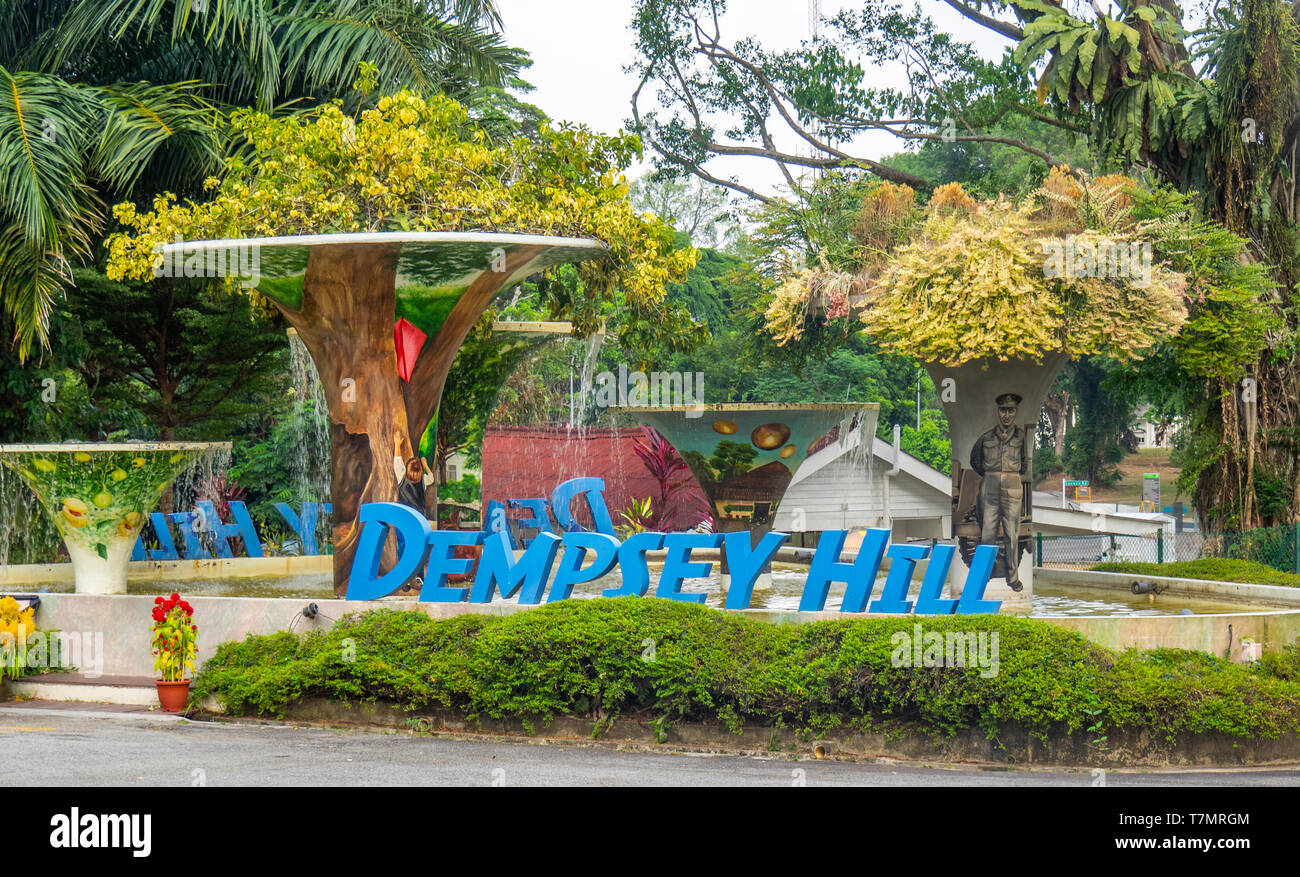 Ornamental garden and sign at entrance to Dempsey Hill a tourist ...