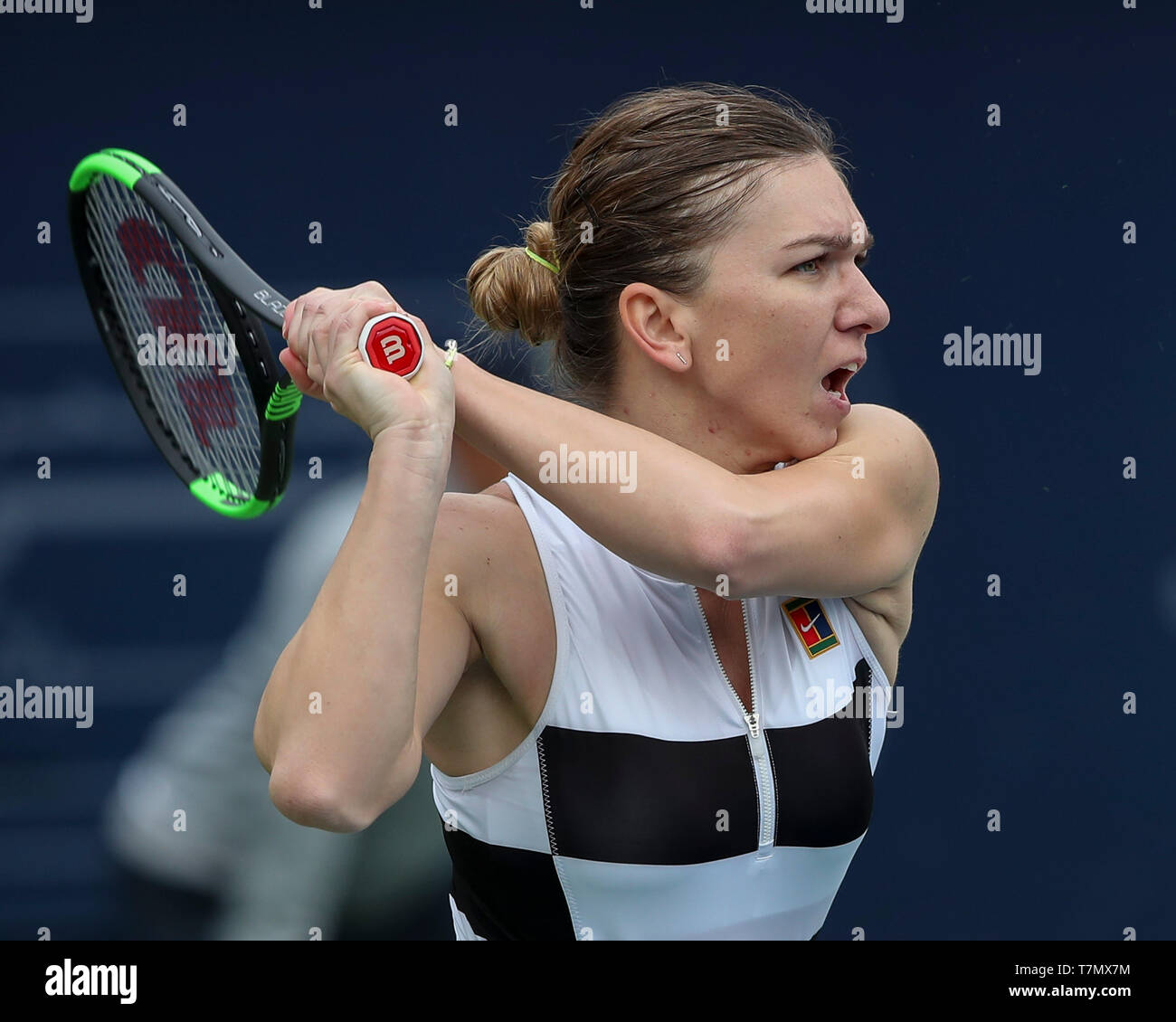 Holding tennis racquet court sport playing professional sportsperson ...