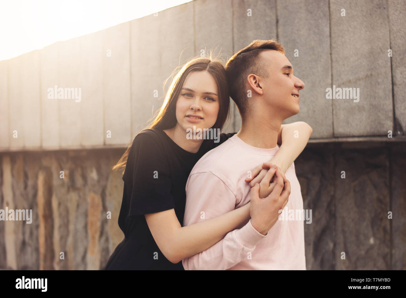 Teenagers hug happy friends boy girl hi-res stock photography and ...