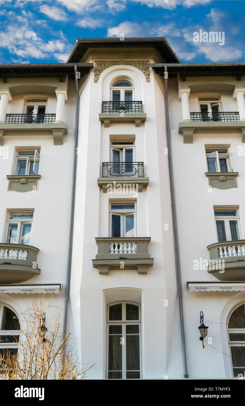 Symmetric perspective view of building with balconies Stock Photo - Alamy