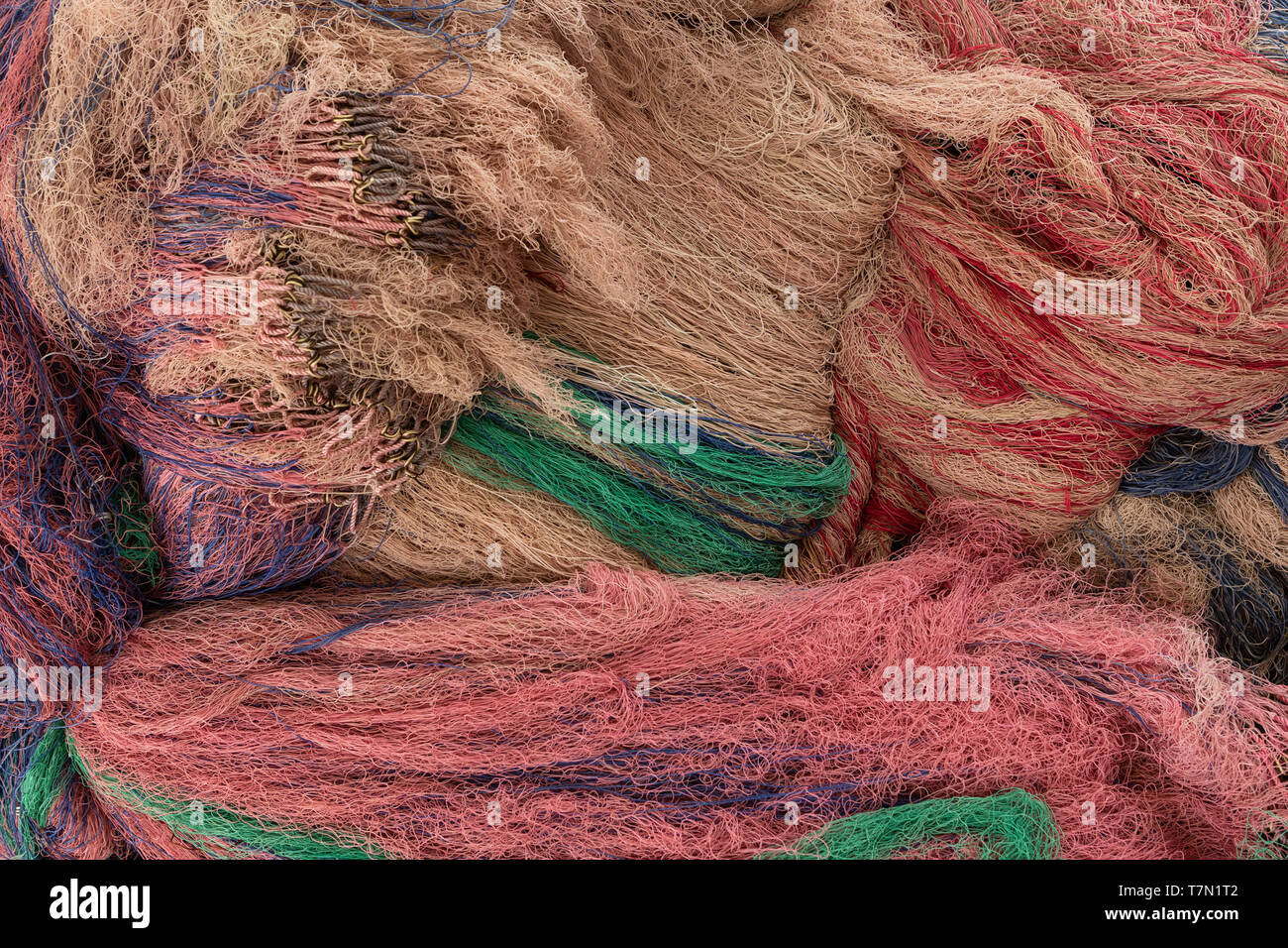 pile of brightly colored fishing nets Stock Photo - Alamy