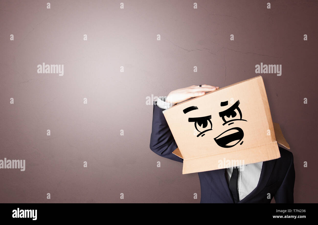 Man with cardboard box head Stock Photo - Alamy