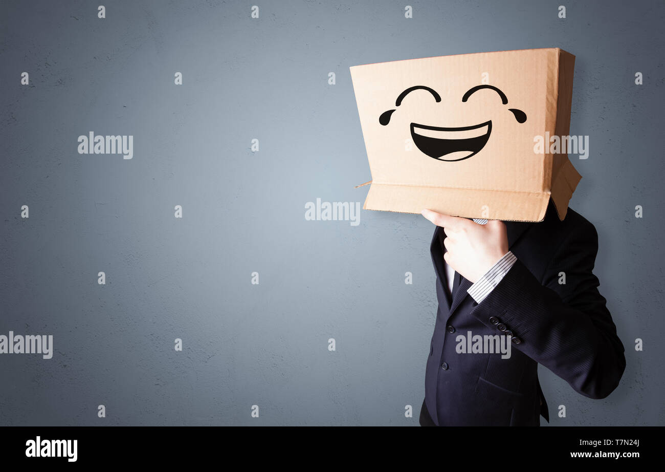 Wearing cardboard box happy face hi-res stock photography and images ...