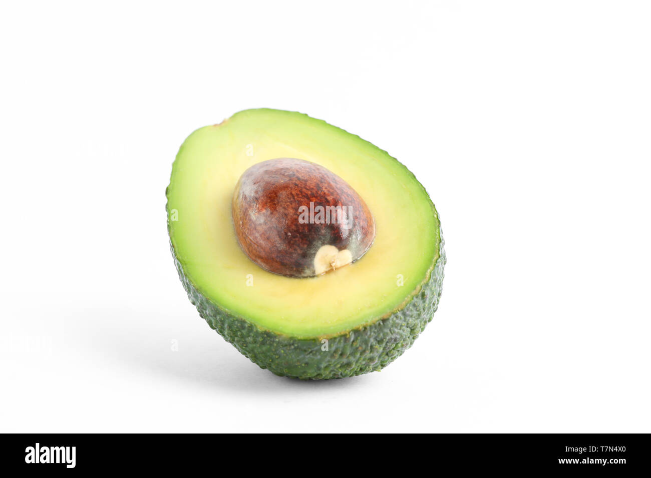 Ripe cut avocado isolated on white background. Healthy food Stock Photo ...