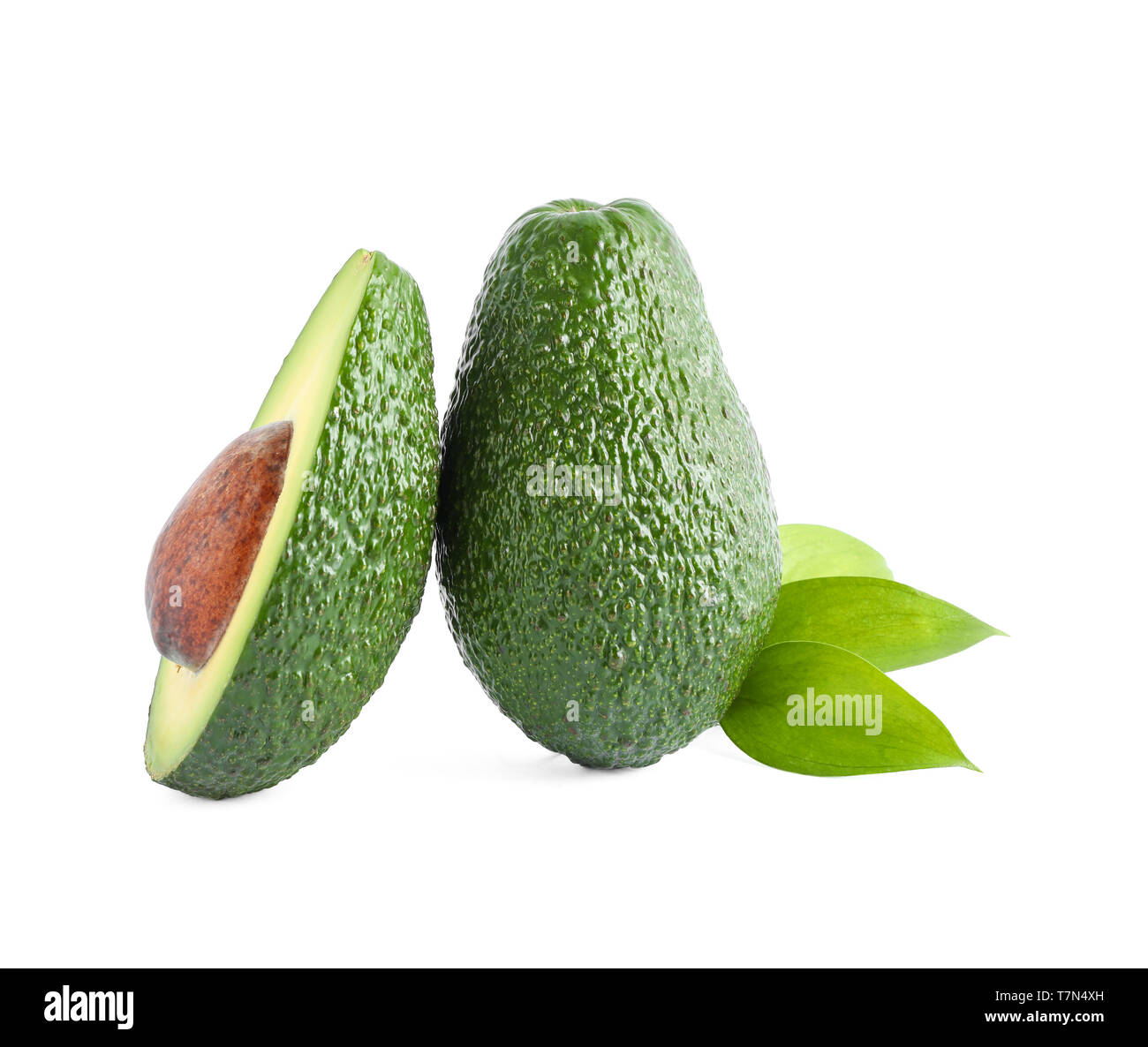 Ripe avocados with leaves isolated on white background. Healthy food ...