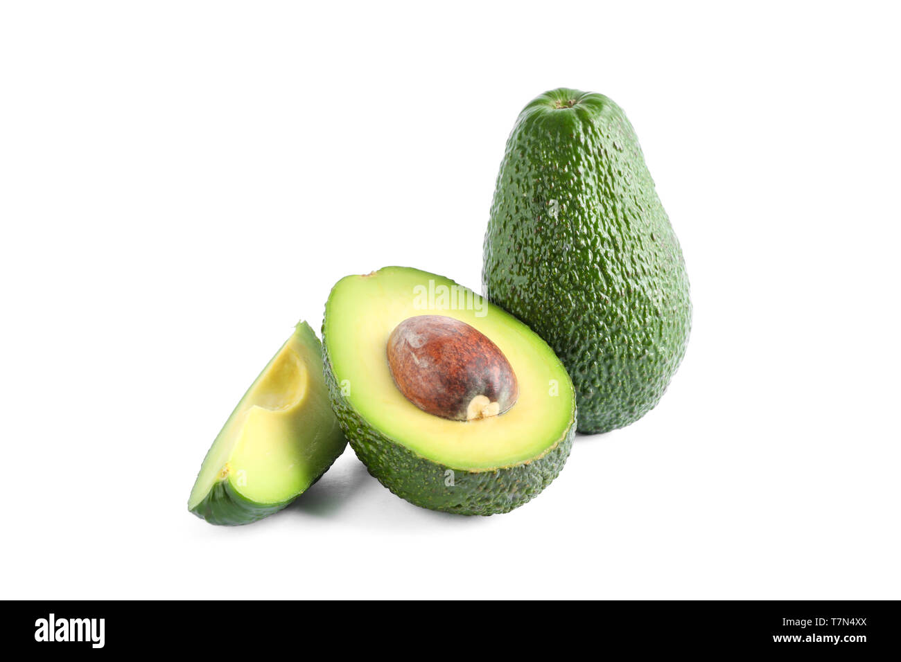 Ripe cut avocados with slice isolated on white background. Vegetarian ...