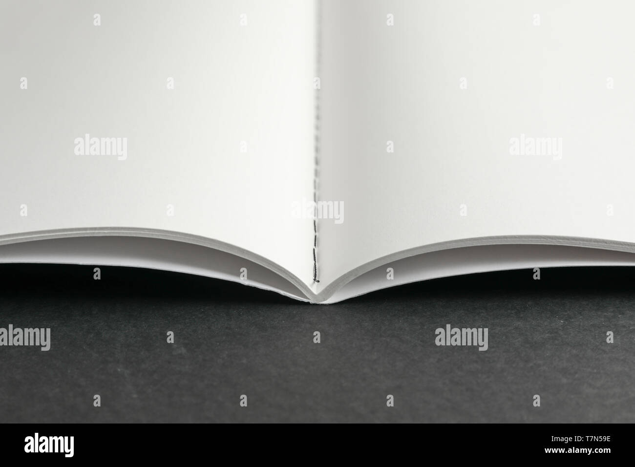 Clean copybook on black background, space for text Stock Photo - Alamy