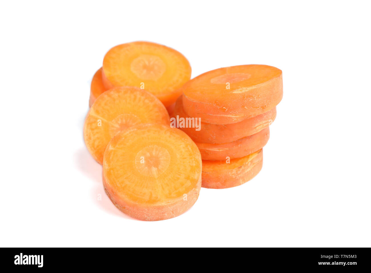 Stacks of carrot isolated on white background Stock Photo - Alamy