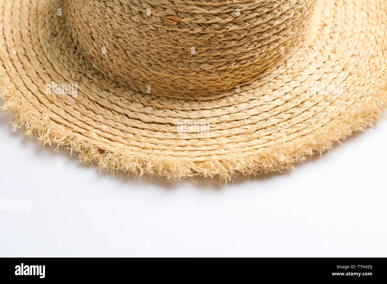 Pretty straw hat on white background. Space for text, closeup Stock ...