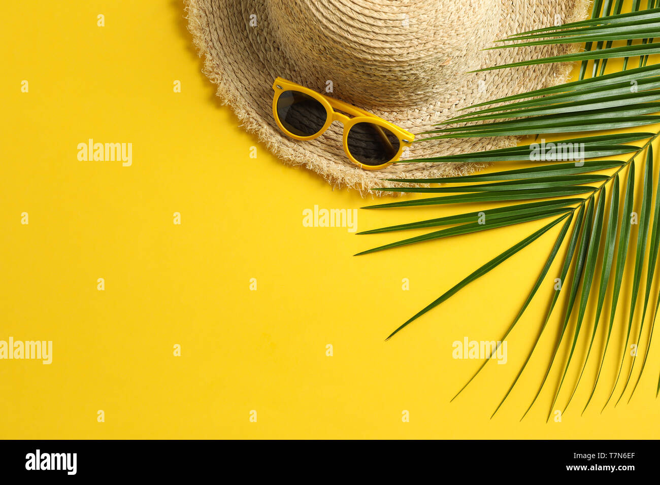 Summer vacation composition on yellow background. Space for text, top ...
