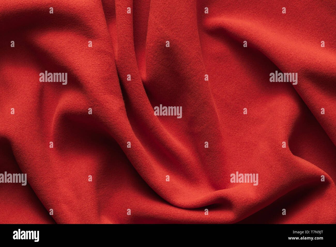 Background texture of red fleece, soft napped insulating fabric made of ...
