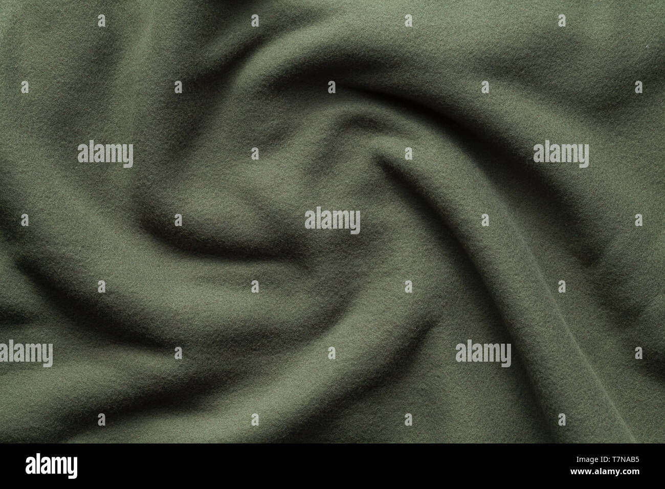 Background texture of dark green fleece, soft napped insulating fabric ...