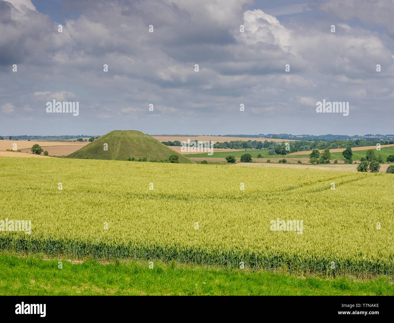 Silbury Hill is a prehistoric artificial chalk mound near Avebury in ...