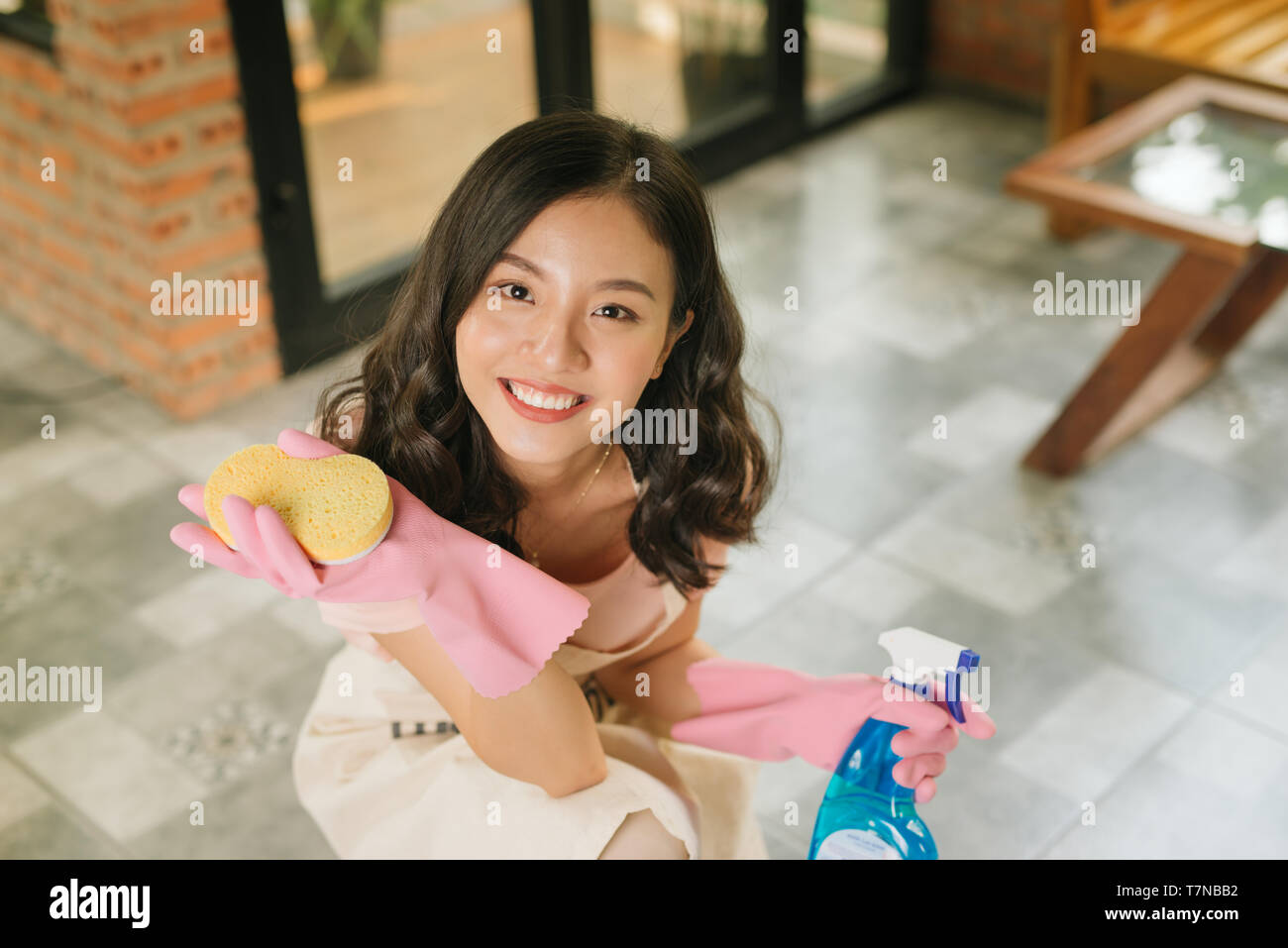 Woman scrubbing floor hi-res stock photography and images - Alamy