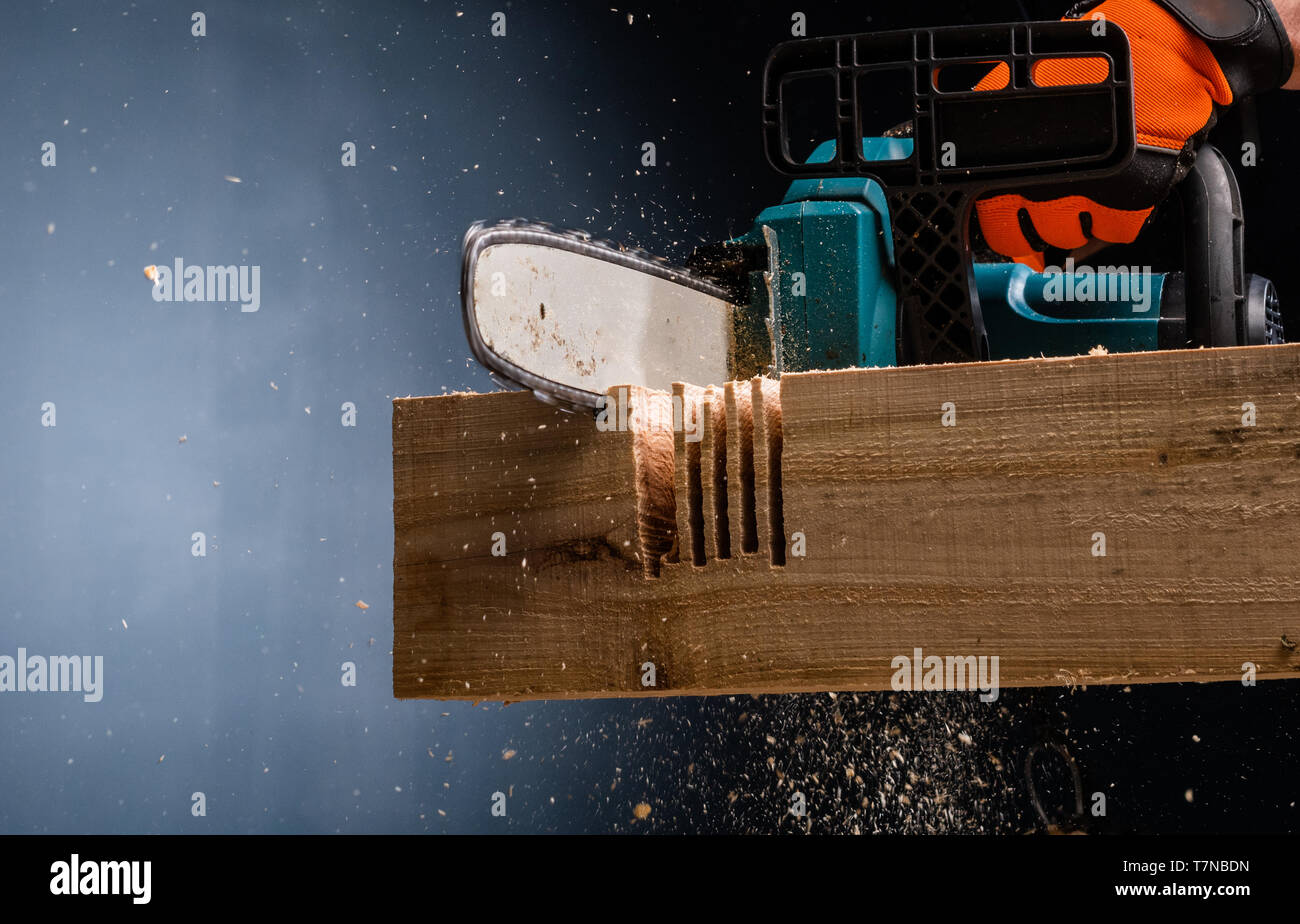 Modern chain saw hi-res stock photography and images - Alamy
