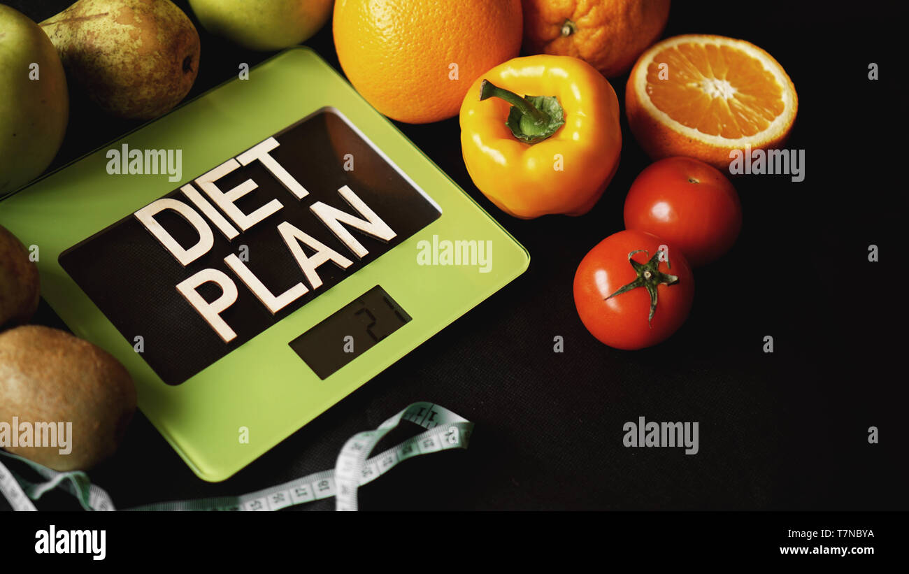 Concept diet. Healthy food, kitchen weight scale. Vegetables and fruits ...