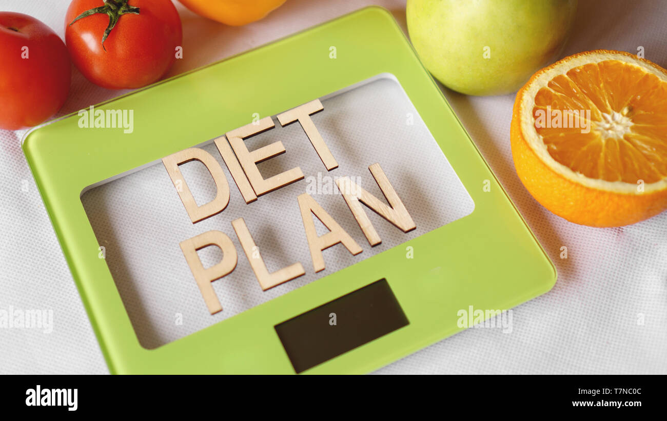 Concept diet. Healthy food, kitchen weight scale. Vegetables and fruits ...
