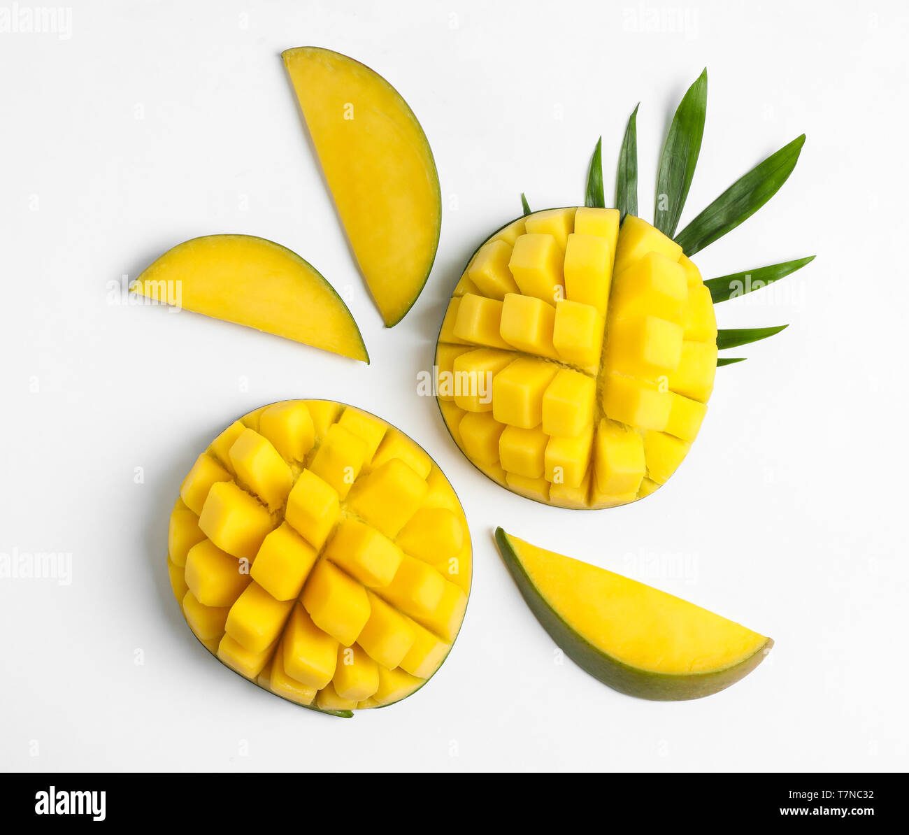 Flat lay composition with ripe mangoes on white background Stock Photo ...