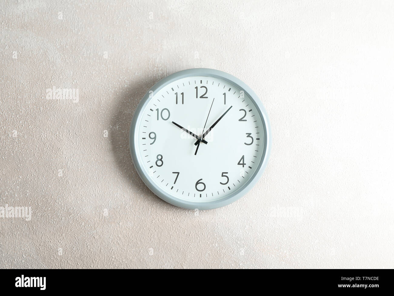 Big beautiful clock hanging on color background, space for text Stock ...