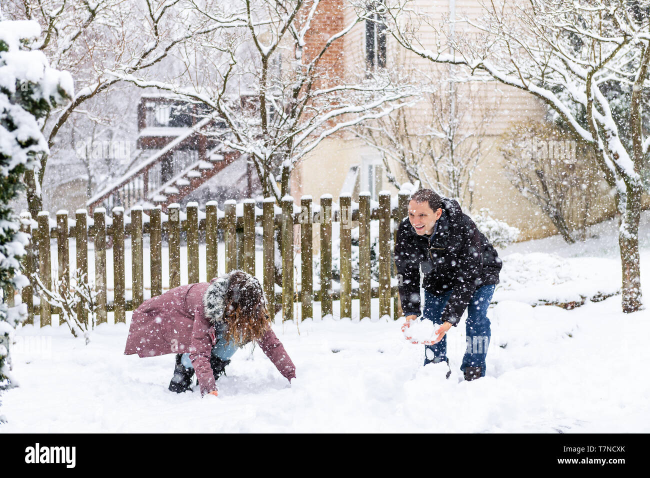 Man making snowball hi-res stock photography and images - Alamy