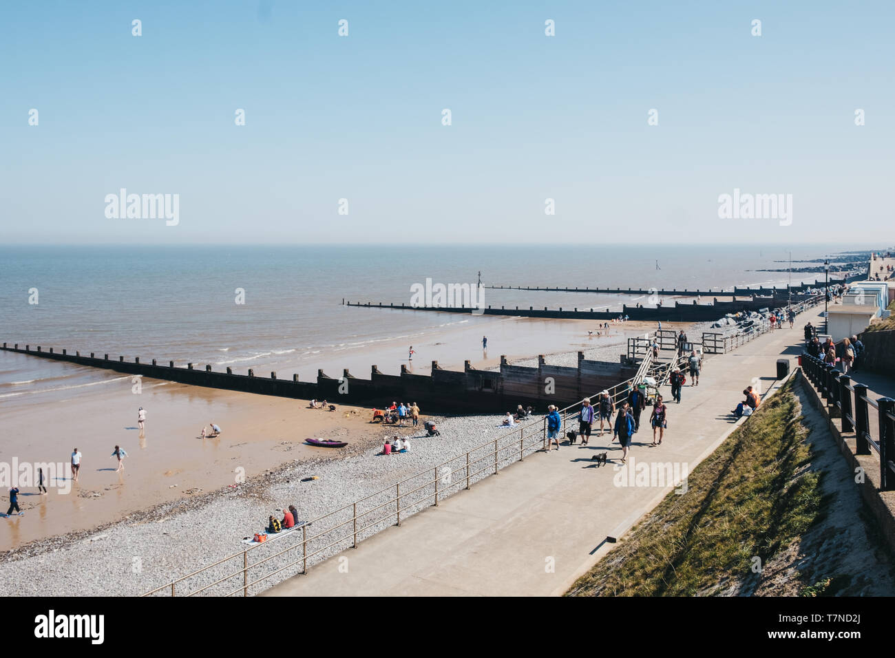 Sheringham, UK - April 21, 2019: People walking on a promenade ...