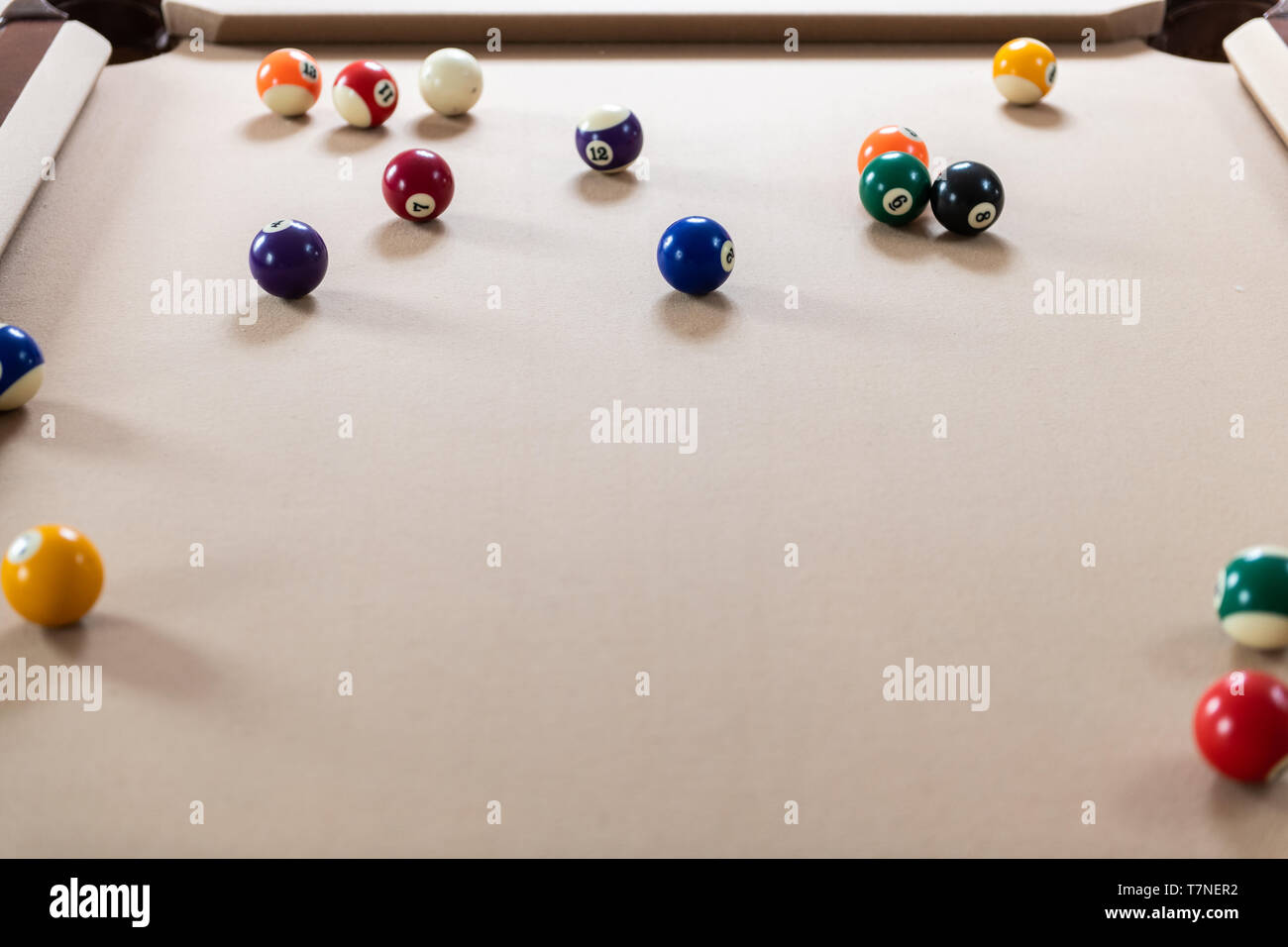 Pool table playing game of billiard with colorful white and color ...